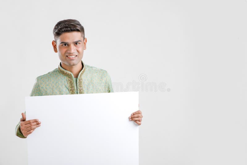 Young Man in Ethnic Wear and Showing Blank Sign Board Stock Image ...