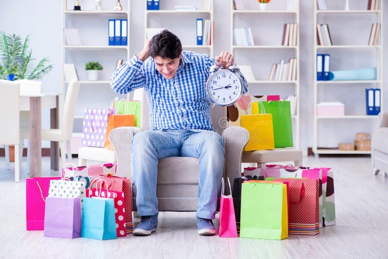 The Young Man after Excessive Shopping at Home Stock Photo - Image of ...