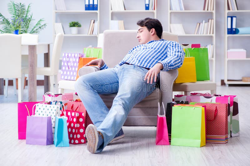 The Young Man after Excessive Shopping at Home Stock Image - Image of ...