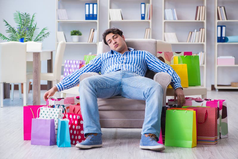 The Young Man after Excessive Shopping at Home Stock Image - Image of ...