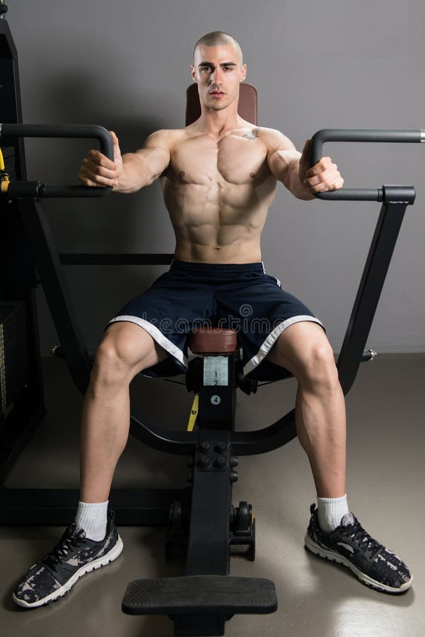 Young Man Exercising Chest in the Gym Stock Image - Image of lifestyle ...