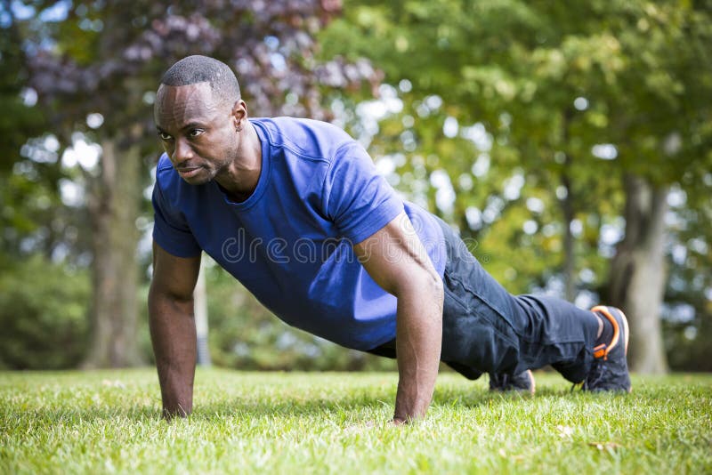 Young Man Exercising Outdoors Stock Photo - Image of nature, handsome ...
