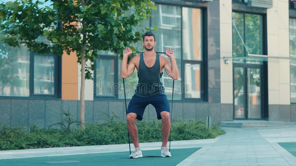Young Man Exercising Outside. Slow Motion of Serious Strong and ...