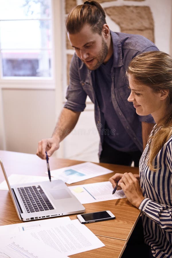 Young Man Explaing To Professional Lady Stock Image - Image of casual ...