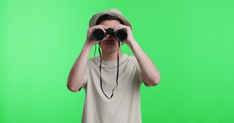 Young Man Explorer in Hat Looking through Binoculars Stock Video ...
