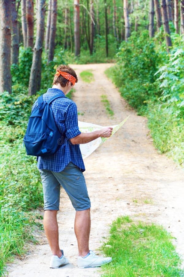 Young Man is Exploring the Map Stock Photo - Image of happiness, rural ...