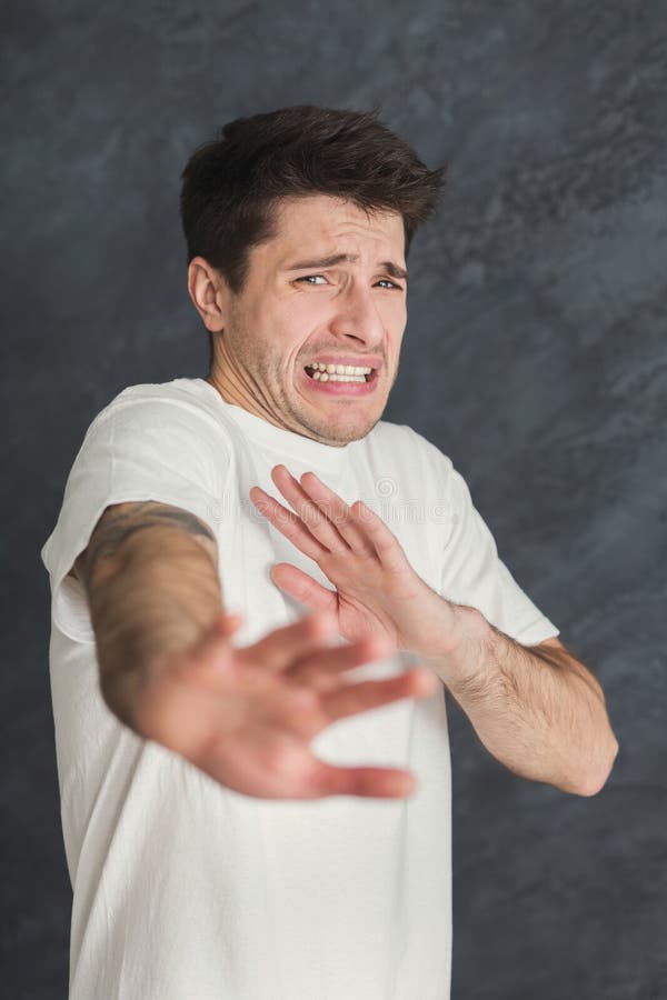 Young Man Expressing Disgust, Grimacing Stock Photo - Image of face ...