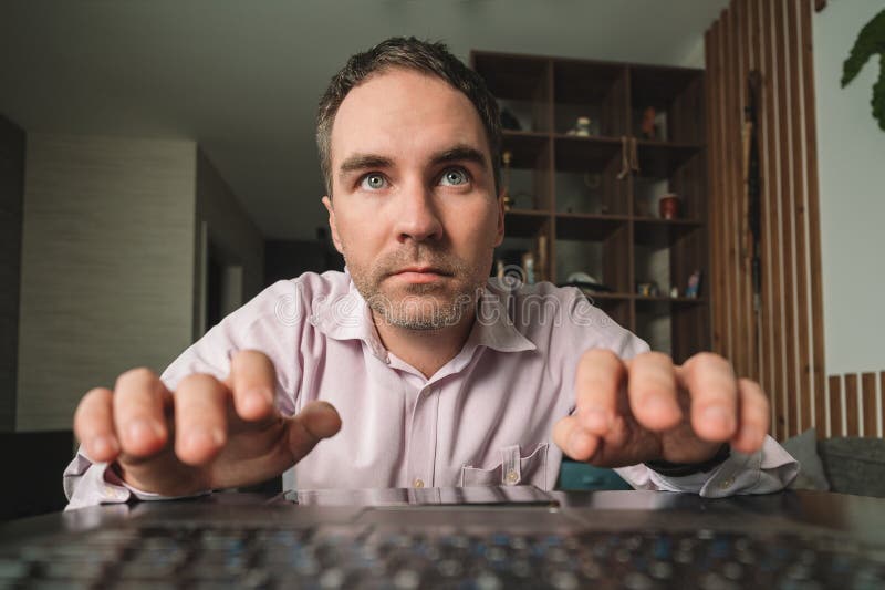 Man in Eyeglasses Holding Laptop and Looking Extremely Perplexed on ...