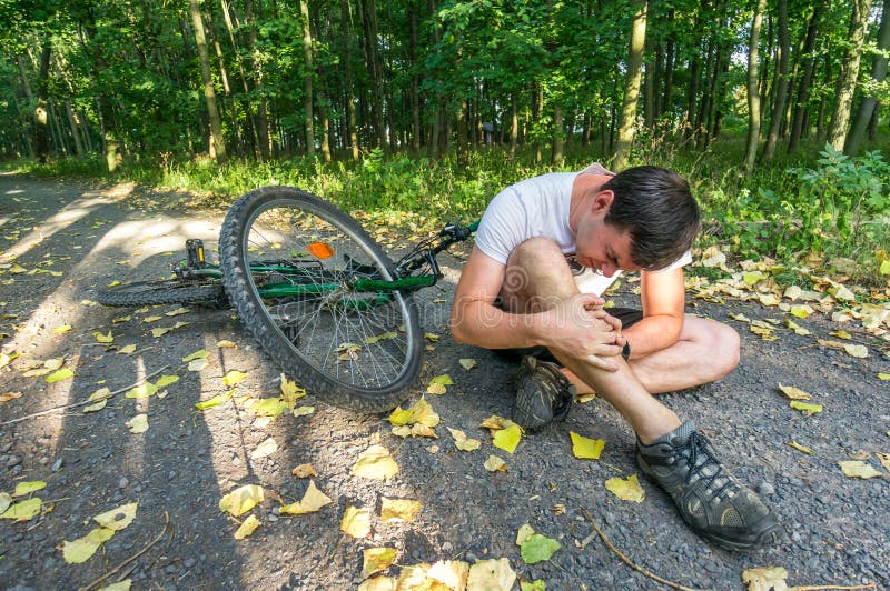 Young Man Fallen from Mountain Bicycle Stock Photo - Image of injured ...