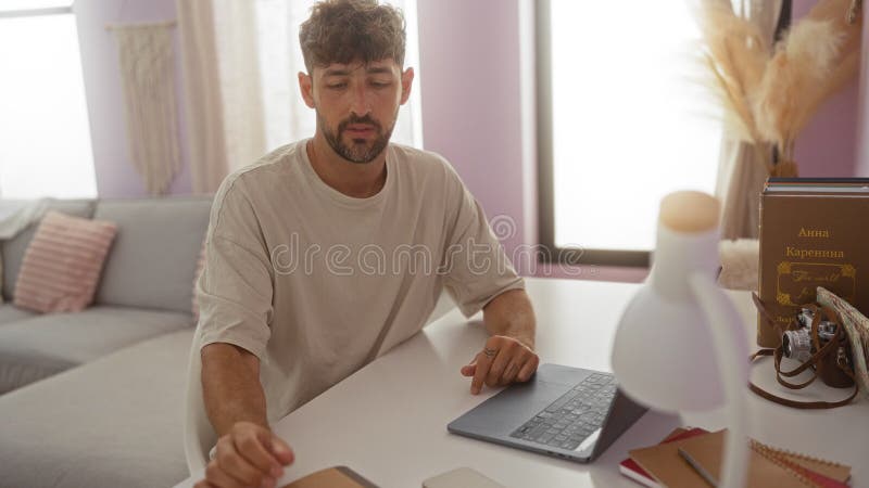 Young Man Feeling Headache while Working on Laptop at Home Interior ...