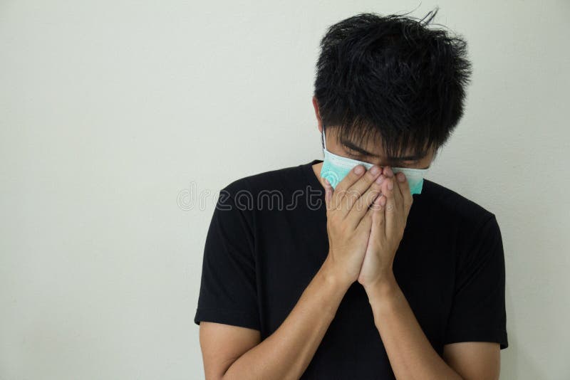 Young Man Feeling Unwell and Wearing Face Mask Stock Photo - Image of ...