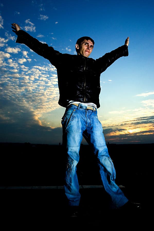 Young Man Feels the Freedom Stock Image - Image of blue, outstretched ...