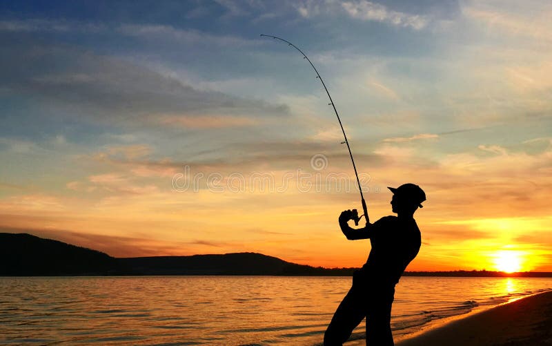 Young Man Fishing at Sunset Stock Photo - Image of active, casting ...
