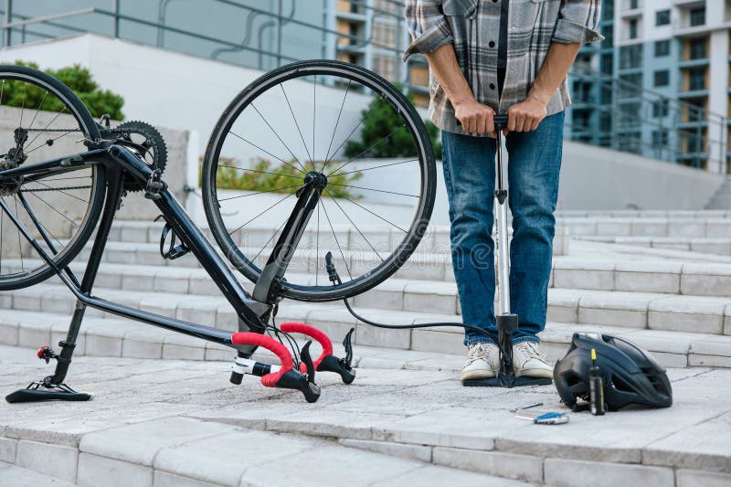 Young Man Fixing a Problem with the Tire Stock Image - Image of cycling ...