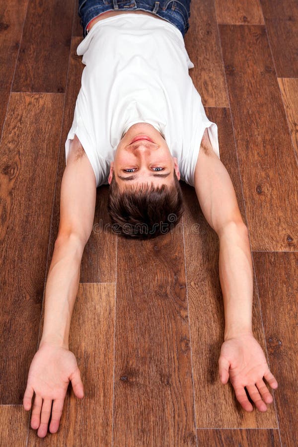 Young Man on the Floor stock image. Image of healthy - 103668821