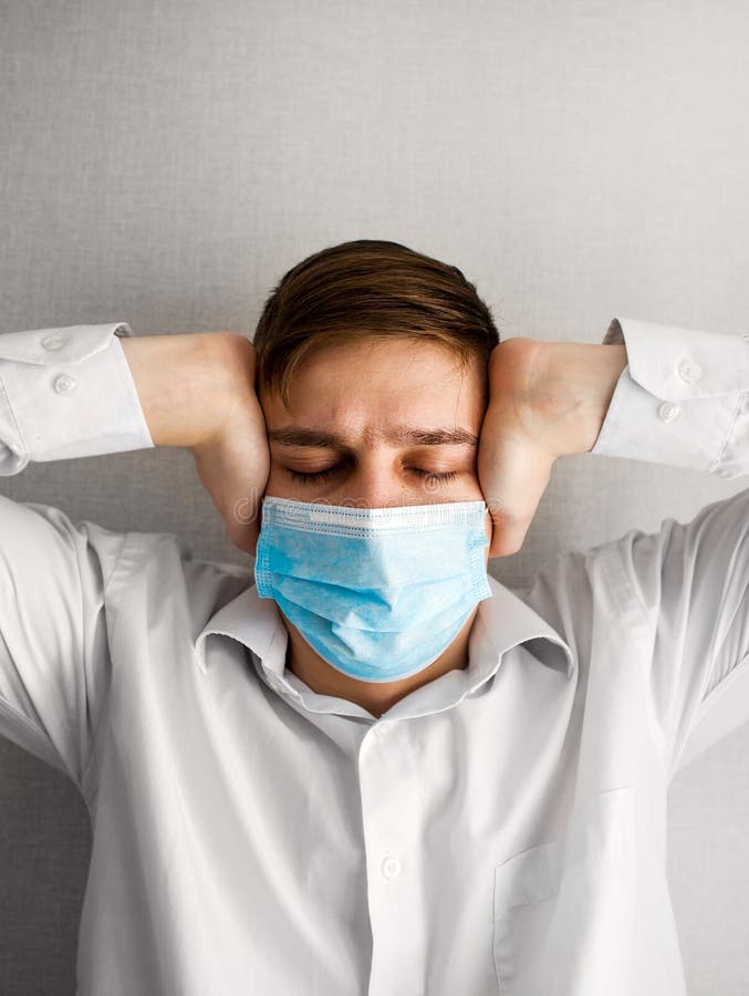 Young Man in a Flu Mask stock photo. Image of cute, anxiety - 214312790