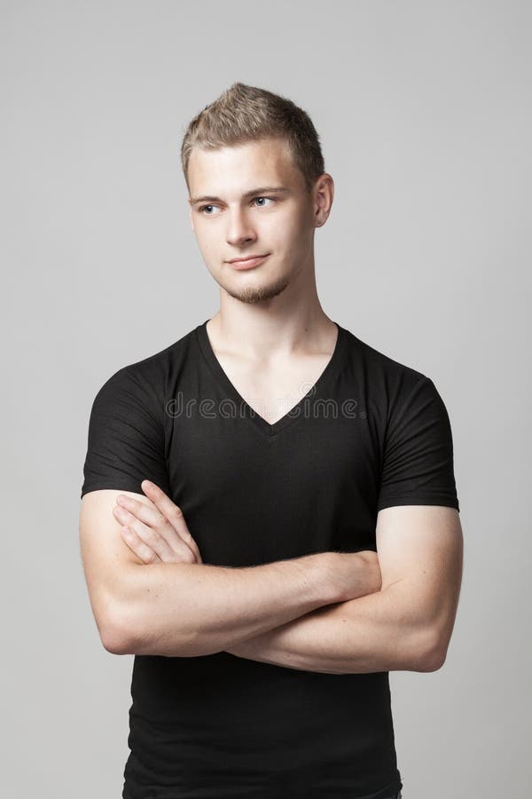 189 Young Man Folded Arms Isolated Light Background Stock Photos - Free ...