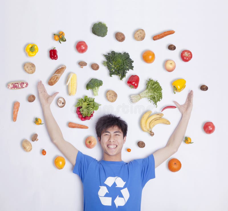 Young Man with Fresh Fruit and Vegetables, Studio Shot Stock Image ...