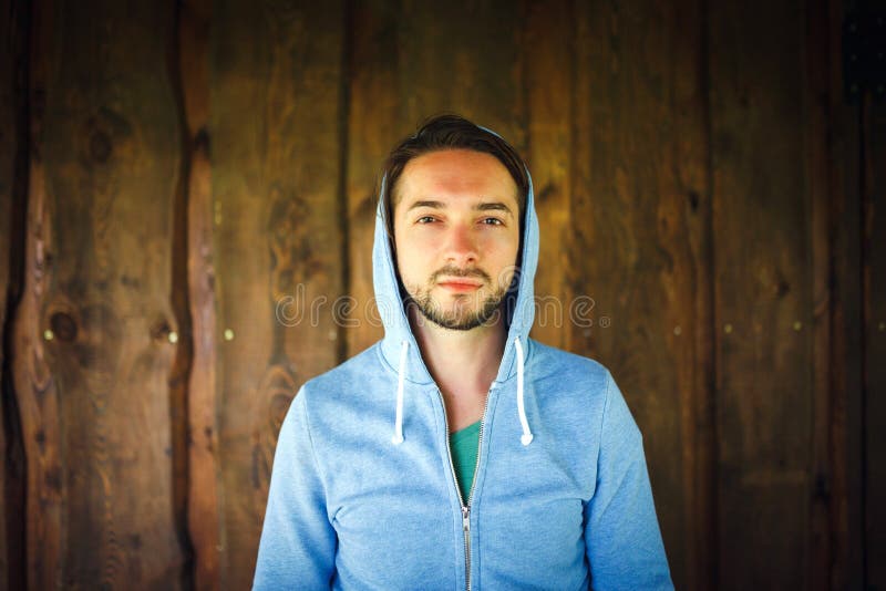Young Man in Front of Wooden Wall Stock Image - Image of lifestyle ...