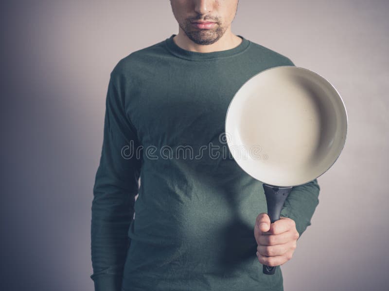 Young Man with Frying Pan and Spatula, Isolated Stock Photo - Image of ...