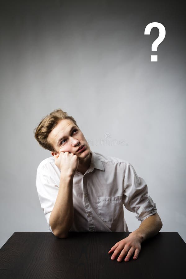 Young Man is Full of Doubts and Hesitation. Young Man and Question Mark ...