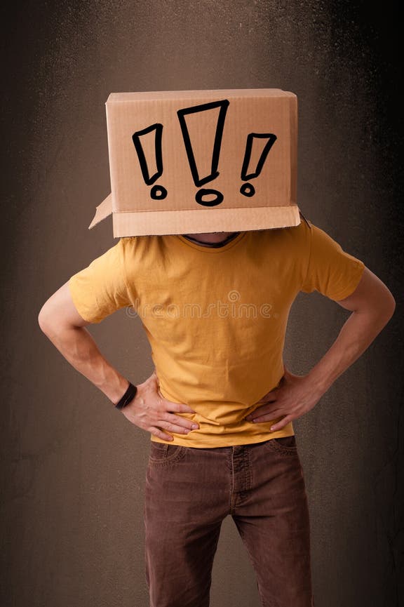 Young Man Gesturing with a Cardboard Box on His Head with Exclamation ...