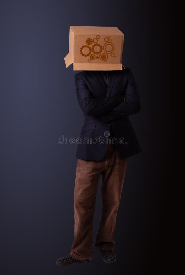 Young Man Gesturing with a Cardboard Box on His Head with Spur W Stock ...