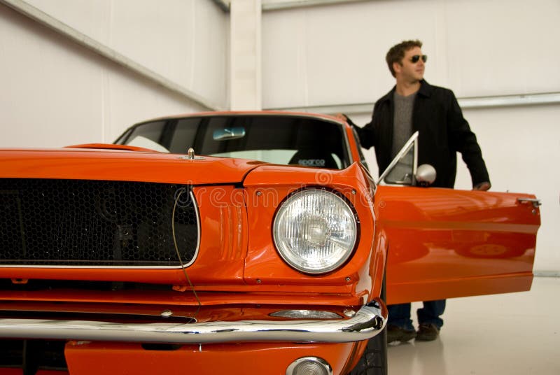 Young Man Getting in a Mustang Car Stock Image - Image of yuppie ...
