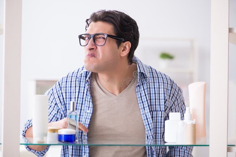 The Young Man is Getting Prepared for Working Day in Bathroom Stock ...