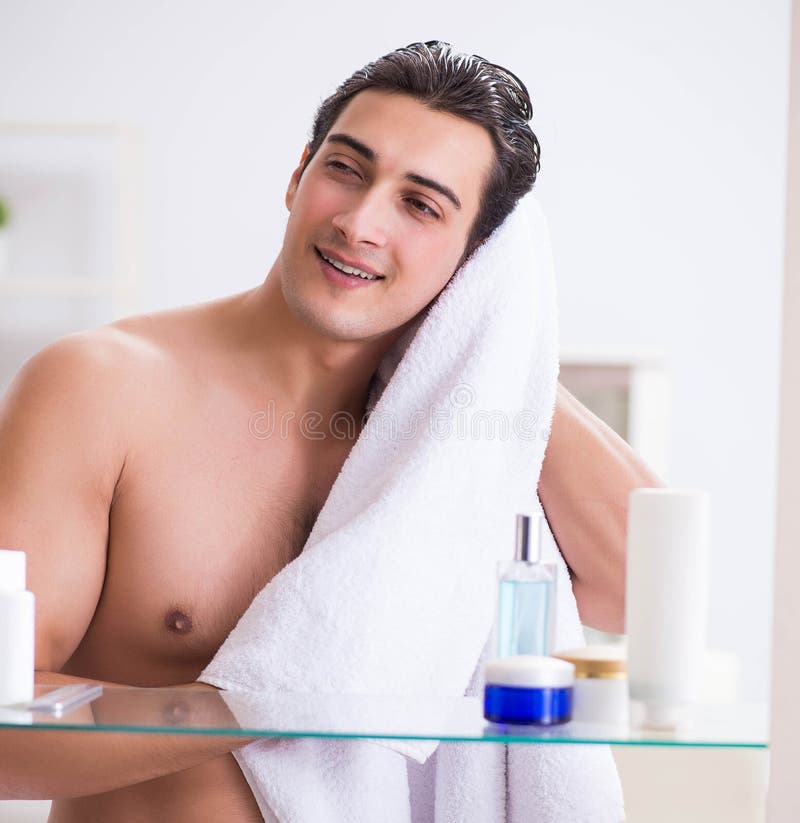Young Man is Getting Prepared for Working Day in Bathroom Stock Photo ...