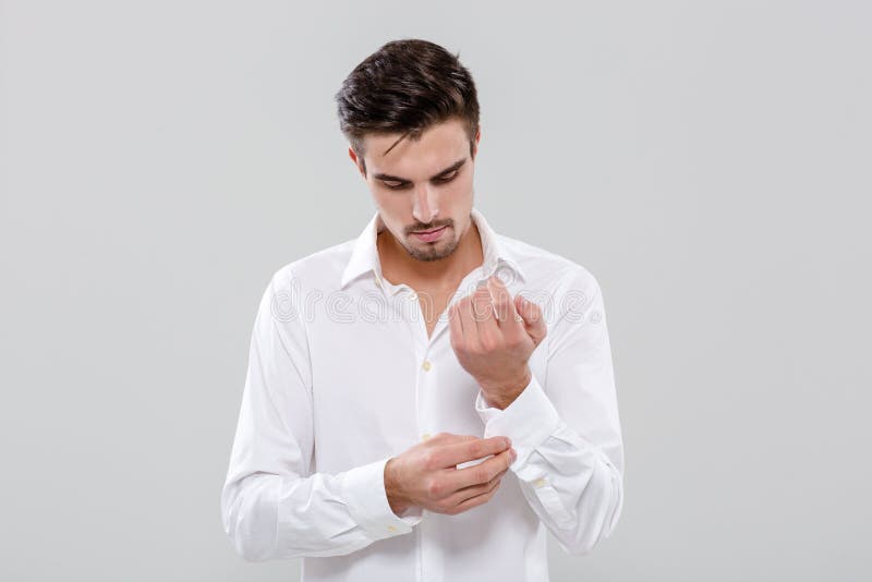 Young Man Getting Ready in Shirt Stock Image - Image of people ...