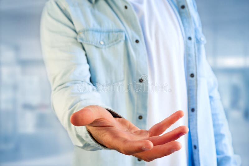 Young Man Giving an Empty Hand at the Office Stock Photo - Image of ...