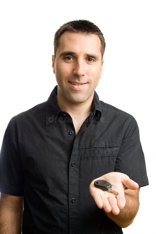 Young Man Giving Key in His Hand Stock Photo - Image of black, hold ...
