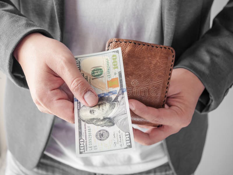 Man Giving Money from His Wallet Stock Photo - Image of finance, person ...