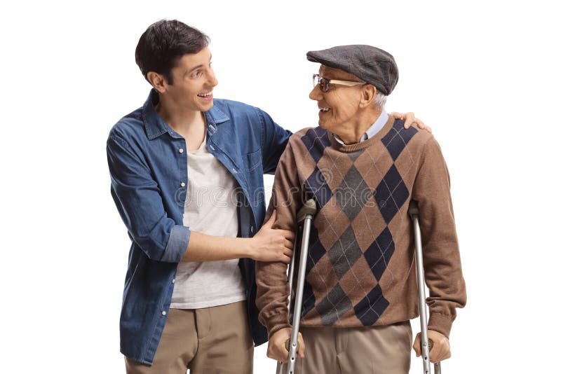 Young Man Giving Support To an Elderly Man with Crutches Stock Photo ...