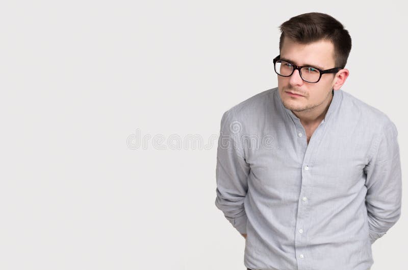 Young Man with Glasses Looking Contemptuously Stock Image - Image of ...