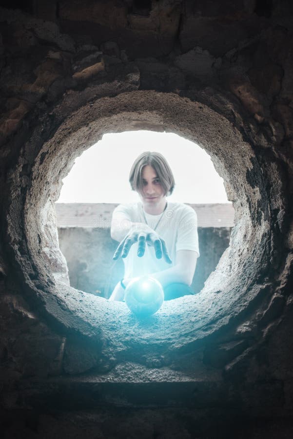 Young Man with Glowing Magic Ball Concept Stock Image - Image of ...