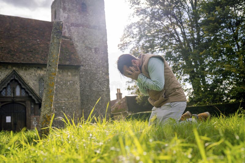 A Young Man Grieving in the Old Graveyard Stock Photo - Image of death ...