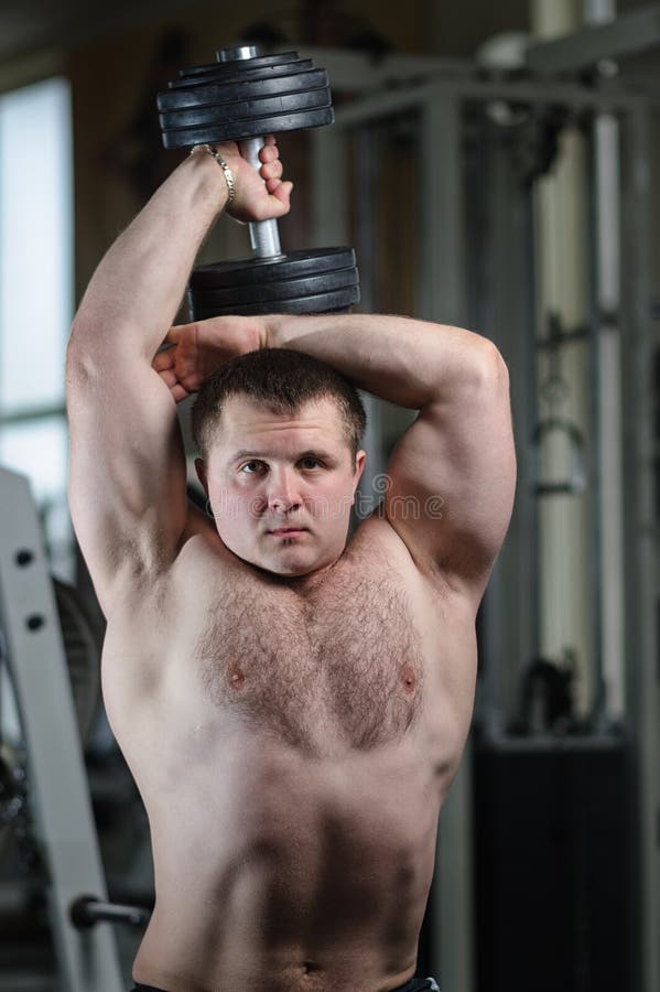Young man at the gym stock image. Image of male, healthy - 54730081