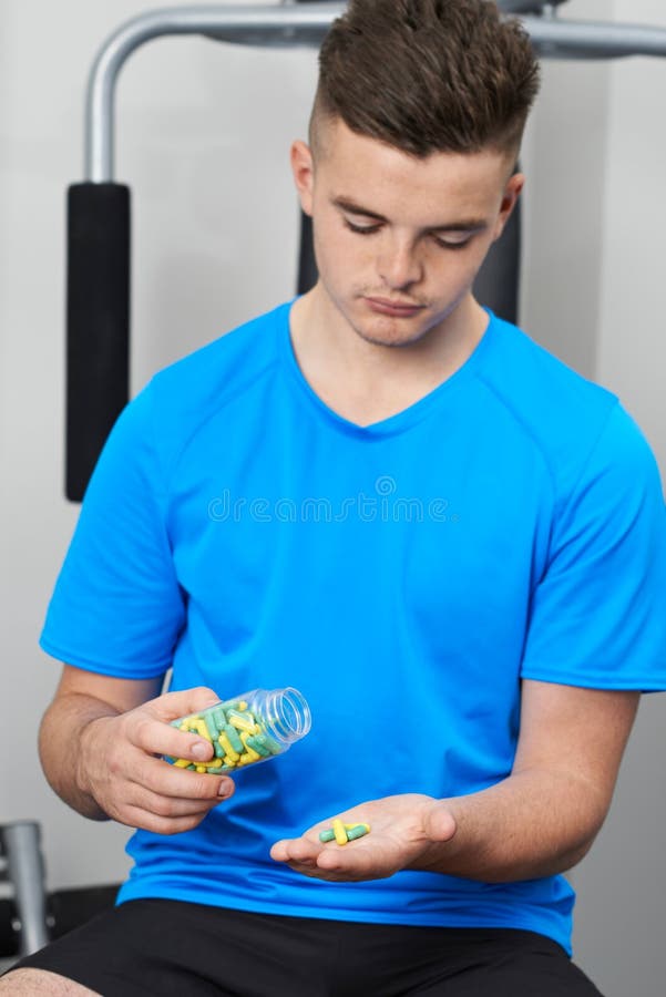 Man Taking Tablets Gym Stock Photos - Free & Royalty-Free Stock Photos ...