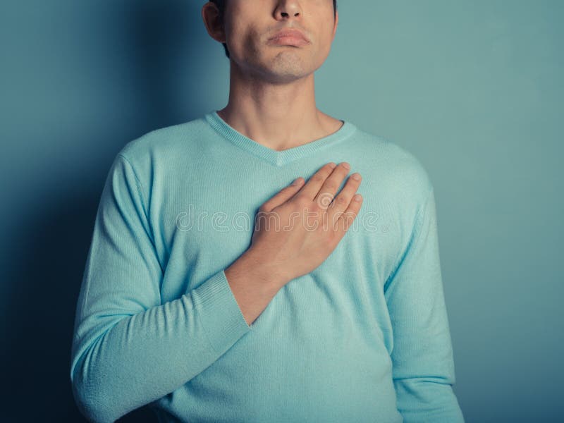 Young Man with Hand on His Chest Stock Image - Image of respect ...