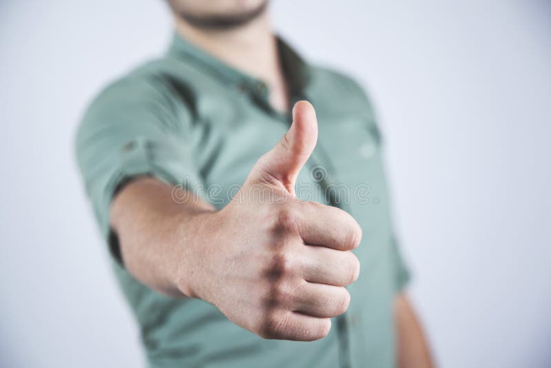 Young man hand okay sign stock photo. Image of achievement - 154114882