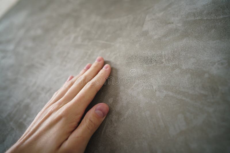 Young Man Hand Touching Concrete Wall Stock Photos - Free & Royalty ...