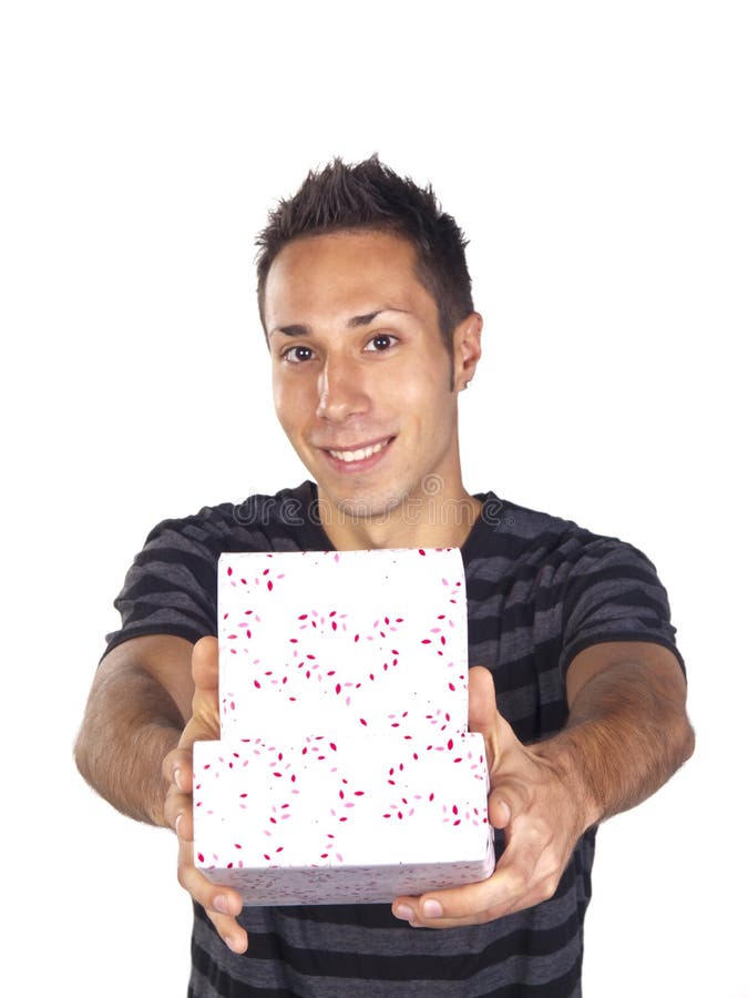 Young Man Handing Out Gifts Stock Photo - Image of birthday, young ...