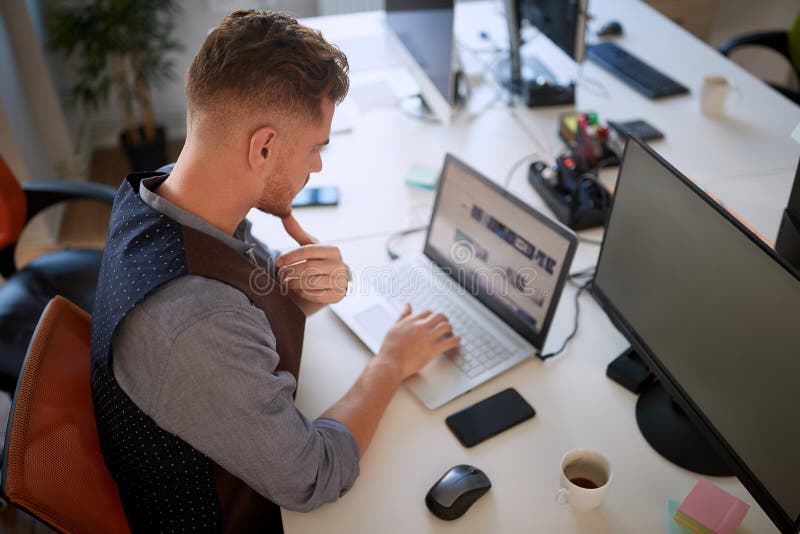 Young Man Hard Working on the Office Laptop Stock Photo - Image of ...