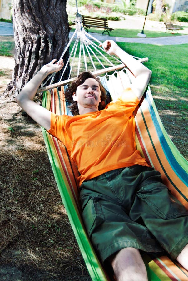 The Young Man Has a Rest in a Hammock Stock Photo - Image of freedom ...