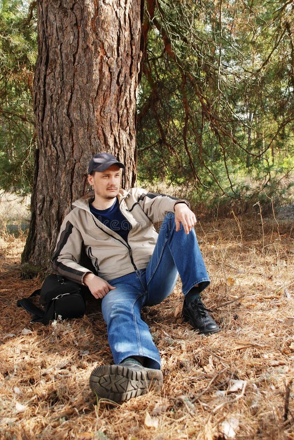 Young the Man Has a Rest Under a Tree Stock Image - Image of activity ...