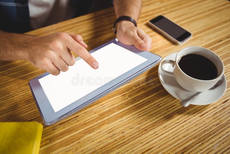 Young Man Having Cup of Coffee Using Tablet Stock Image - Image of ...