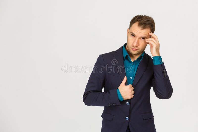 Young Man Having Doubts and with Confuse Face Expression while ...