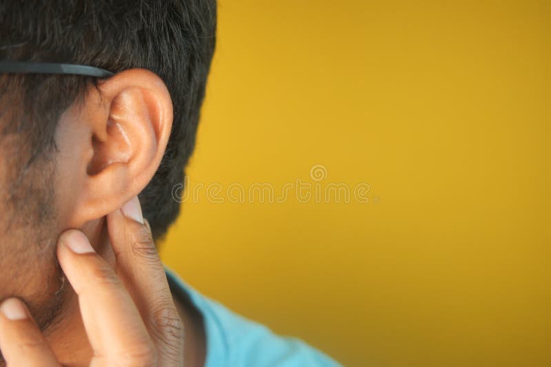 Young Man Having Ear Pain Touching His Painful Ear , Stock Image ...